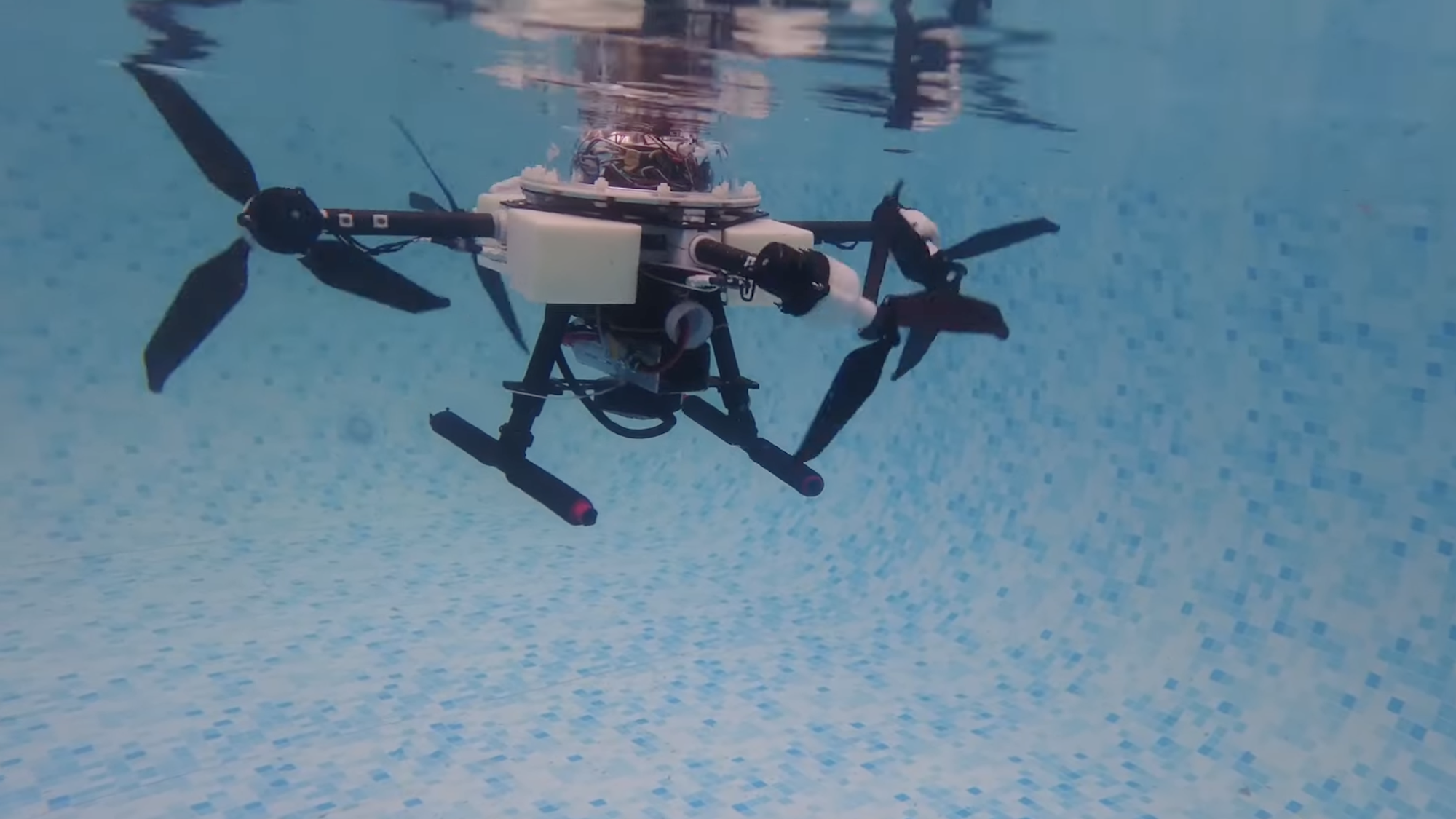 This quadcopter easily soars through both air and water | Popular Science