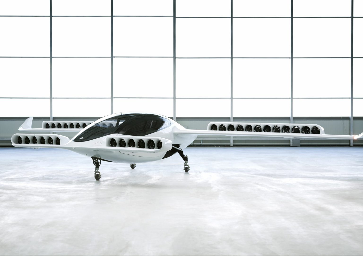 Watch this electric air taxi take off vertically, thanks to 36 ...