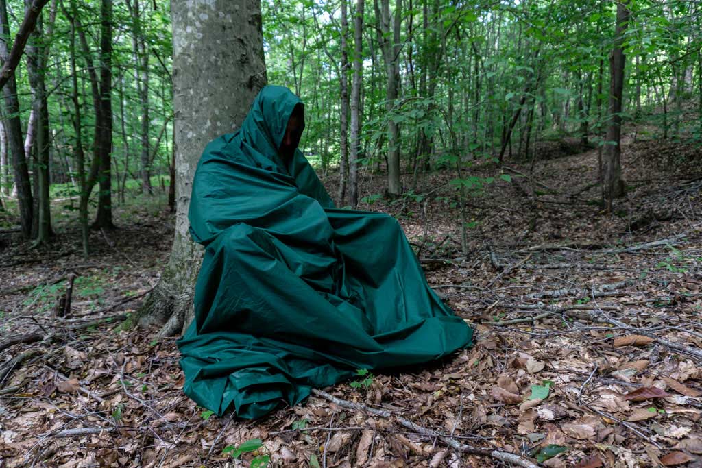Stay warm and dry with these improvised tarp shelters