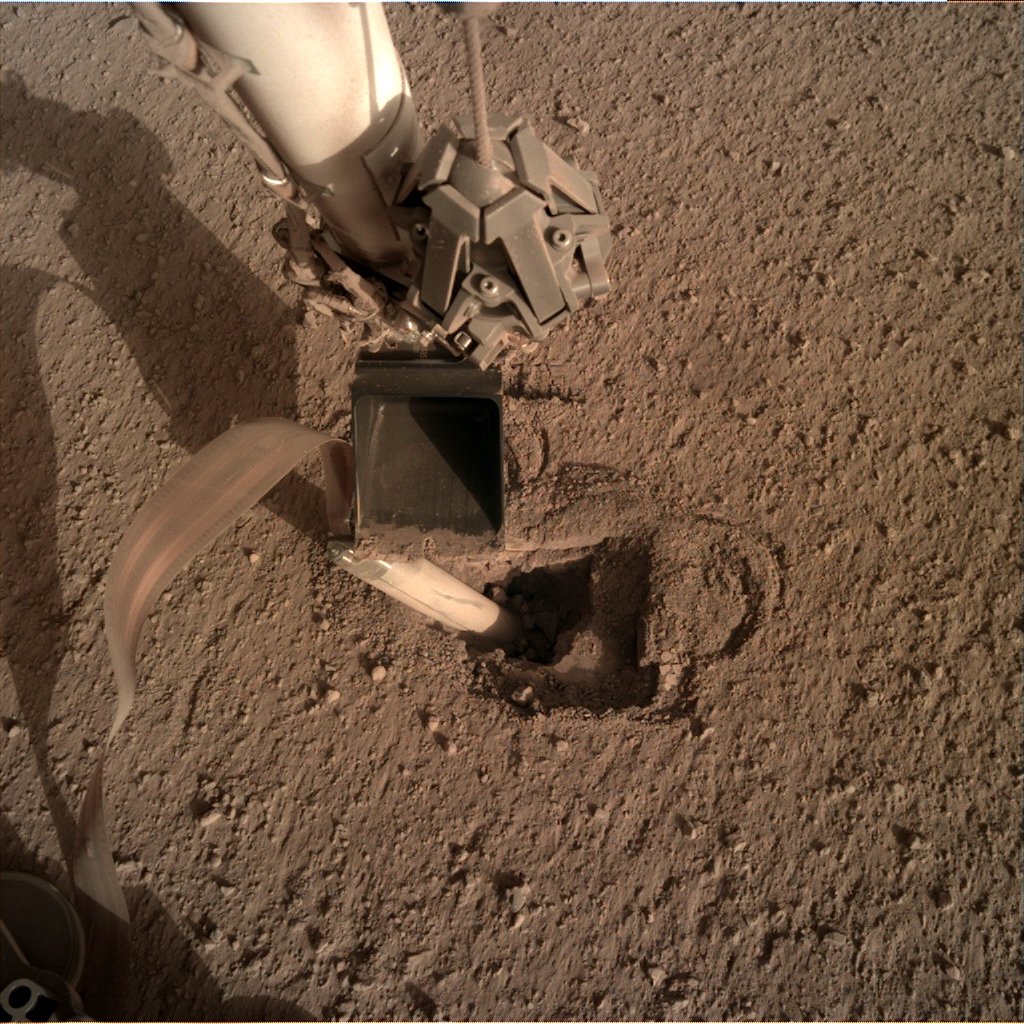 At long last, NASA’s probe finally digs in on Mars