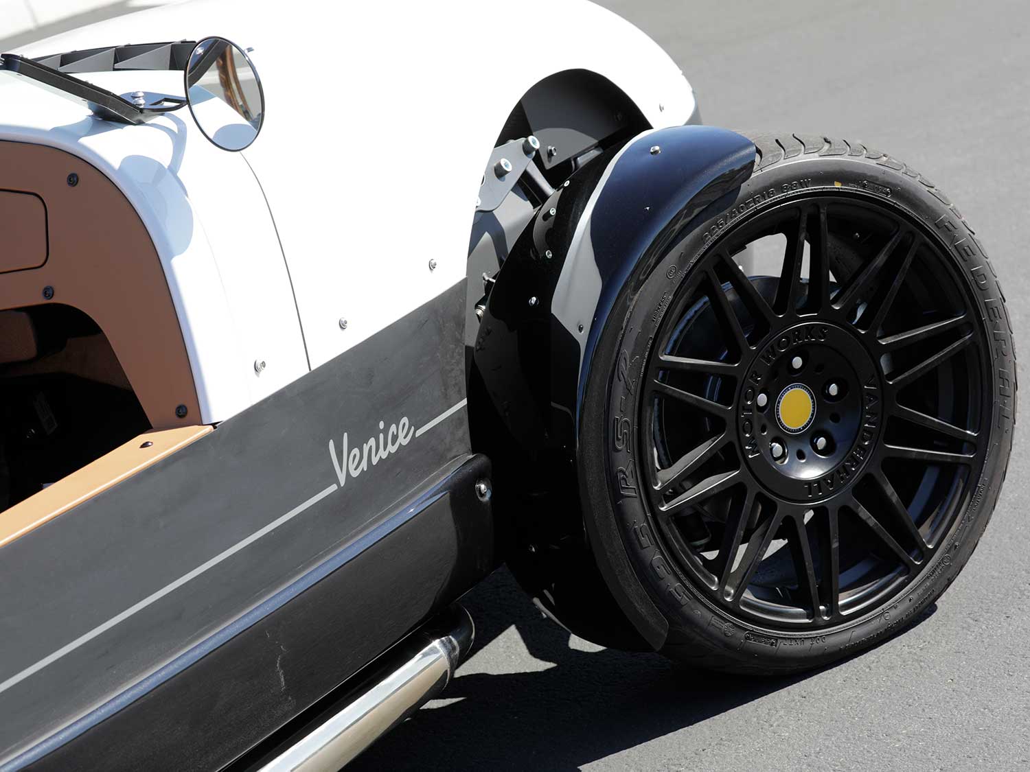 This bespoke ride is half car, half motorcycle, all fun