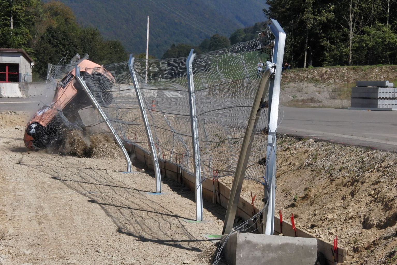 Engineers plow a car and a cannonball into a fence | Popular Science