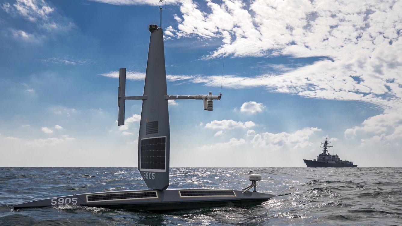 How Saildrones and a destroyer teamed up at sea | Popular Science