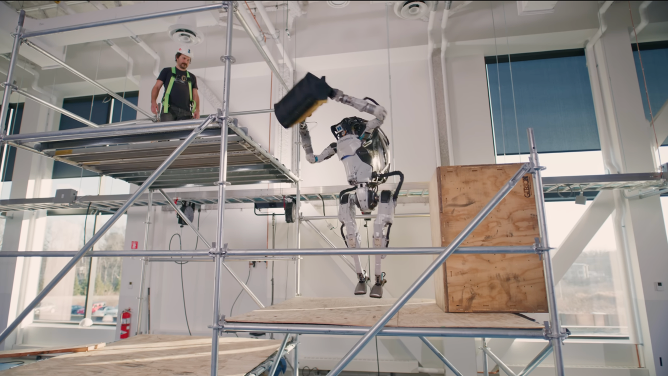 Boston Dynamics' Atlas robot grabs and tosses stuff now | Popular Science