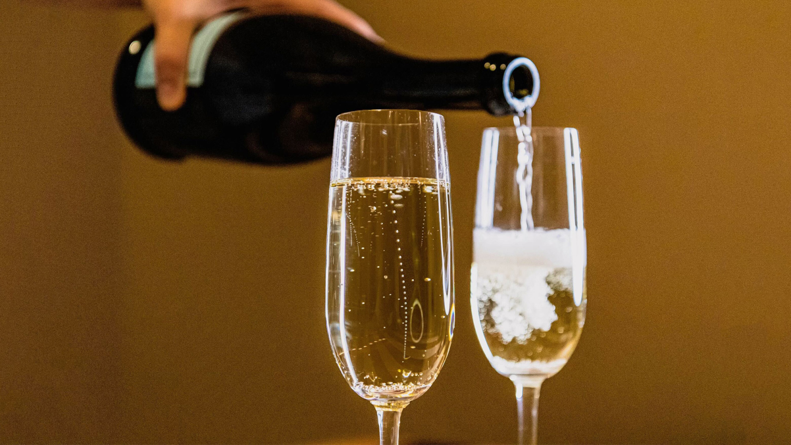 Why champagne bubbles float in a straight line | Popular Science