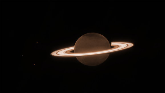 Saturn's rings glow in latest JWST image | Popular Science