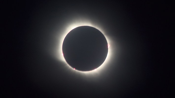 Why do solar eclipses happen? | Popular Science