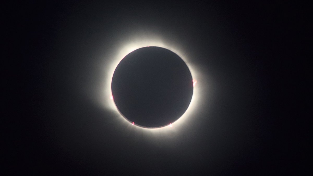 Why do solar eclipses happen? | Popular Science