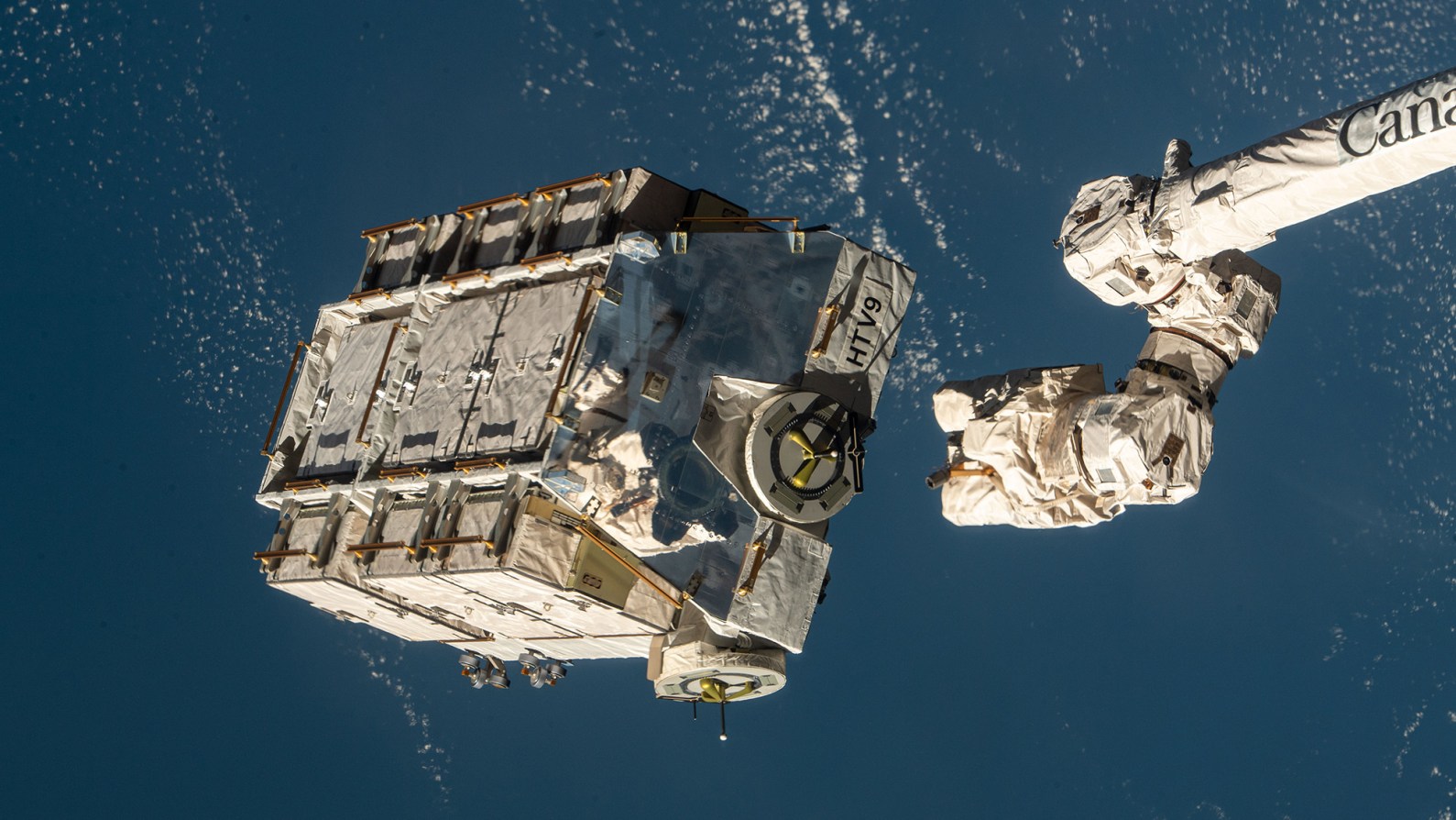An Amazing Pic of Discovery Docking with the ISS, Taken from Earth