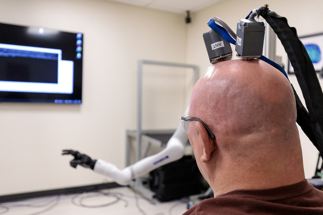 Brain-connected implants help paralyzed patients feel objects and ...