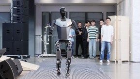 Human vs: humanoid: Half-marathon pits robots against 12,000 joggers ...