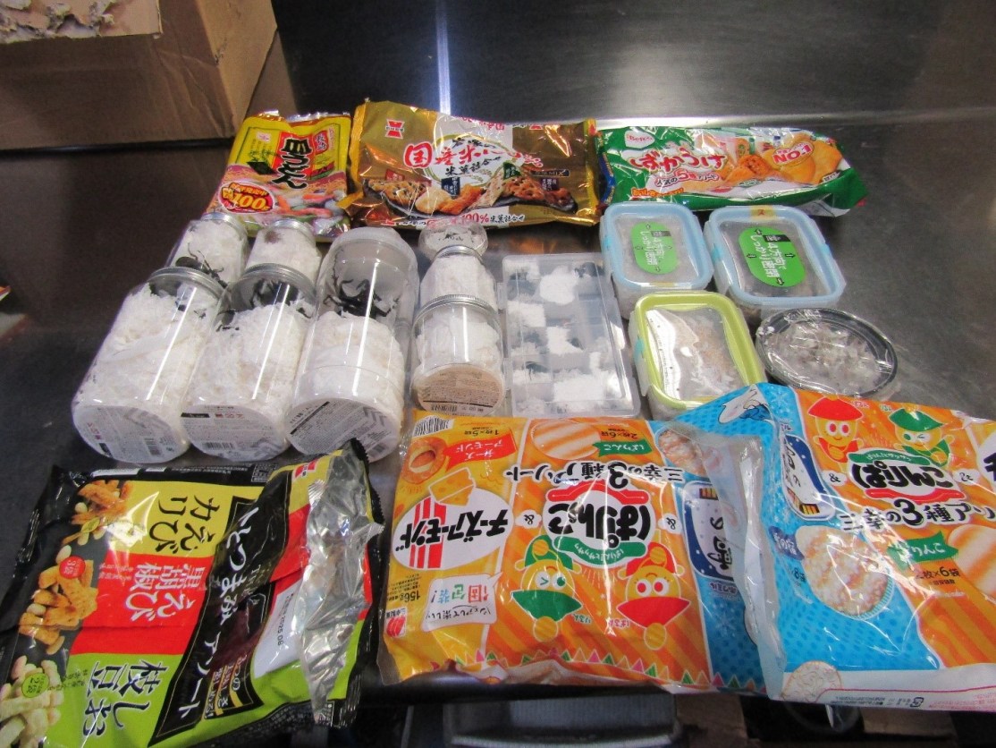 Smugglers try to disguise giant beetles as Japanese snacks ...