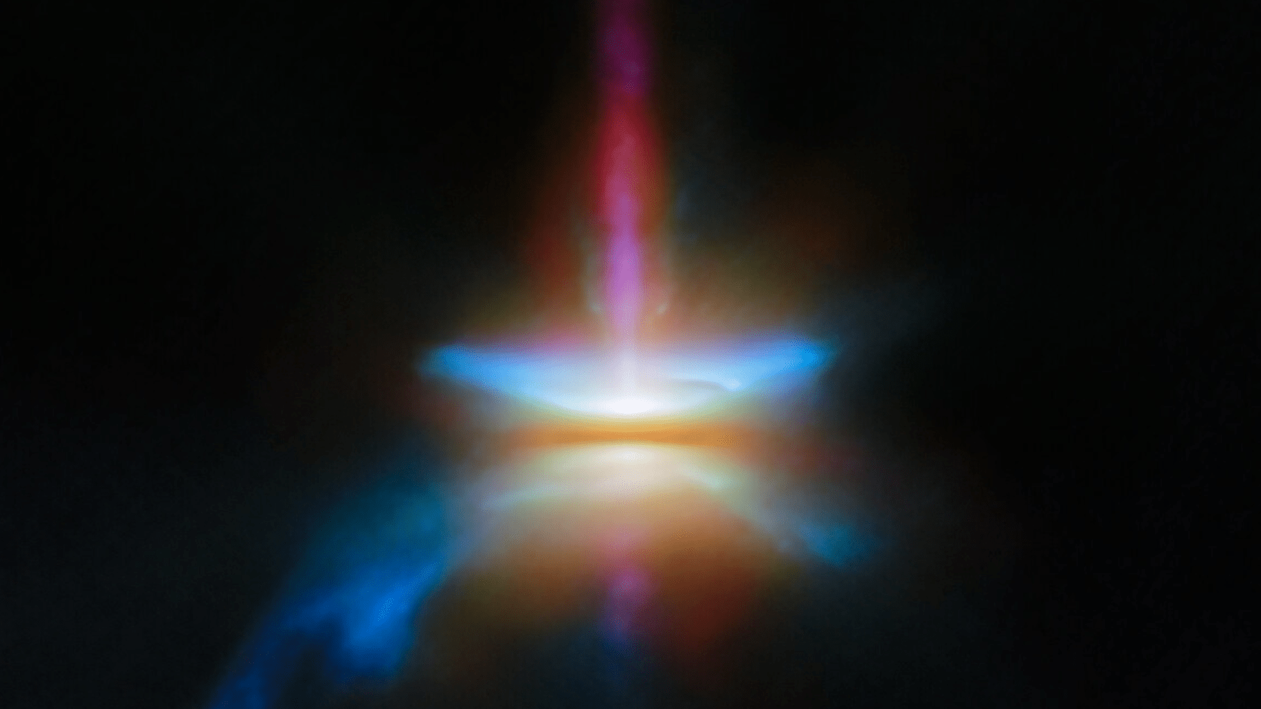 Newborn stars surround a planet-forming disk 450 million light years ...