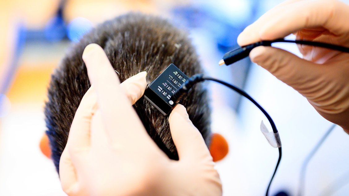 Brain implant helps woman with paralysis speak with her own voice again ...