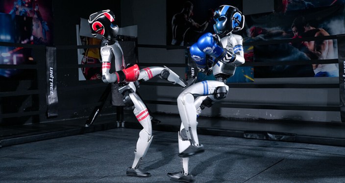 In world’s first humanoid boxing match, gloating robot face plants ...