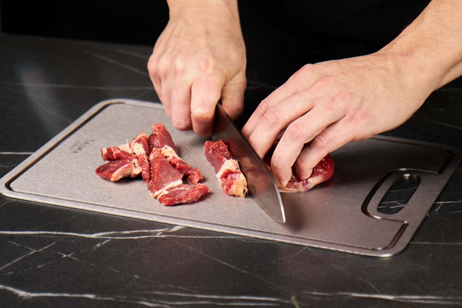 The cutting board that never stains, cracks, or stinks is over $100 off ...