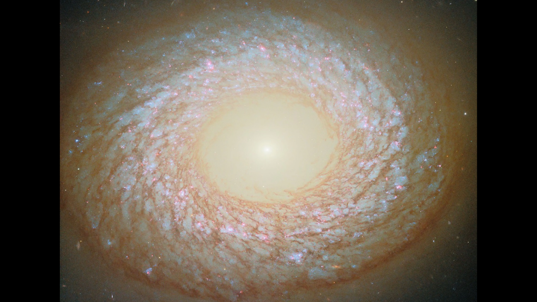 Galaxy NGC 2775 continues to baffle astronomers | Popular Science