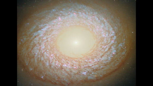 Galaxy NGC 2775 continues to baffle astronomers | Popular Science
