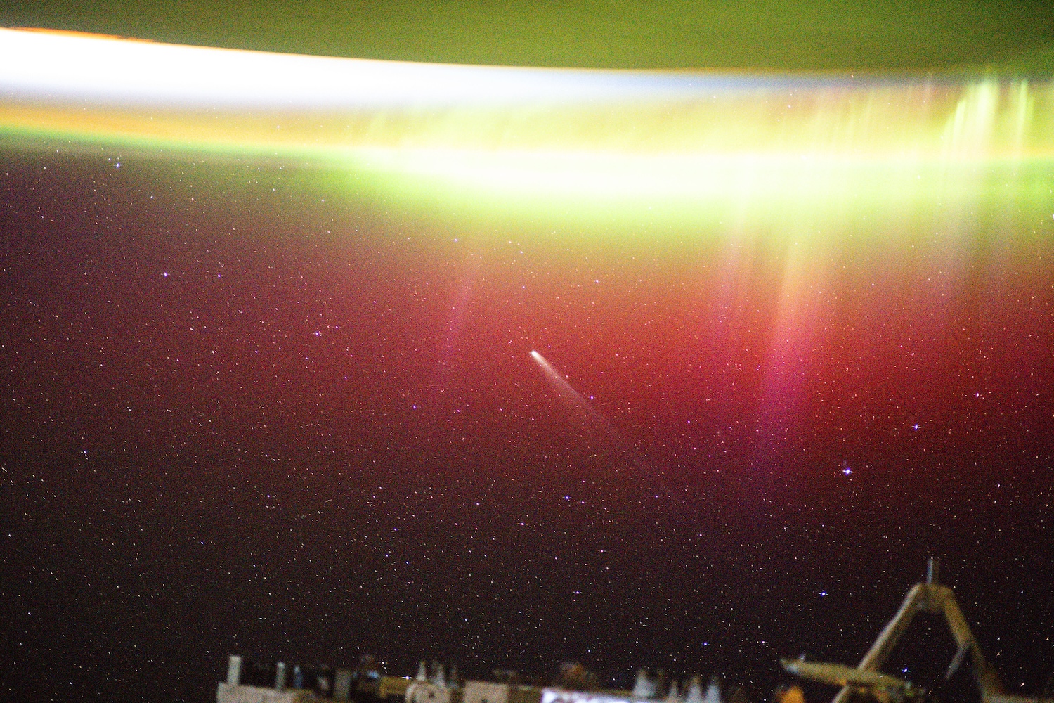 ISS astronauts photograph two comets soaring over Earth's auroras ...