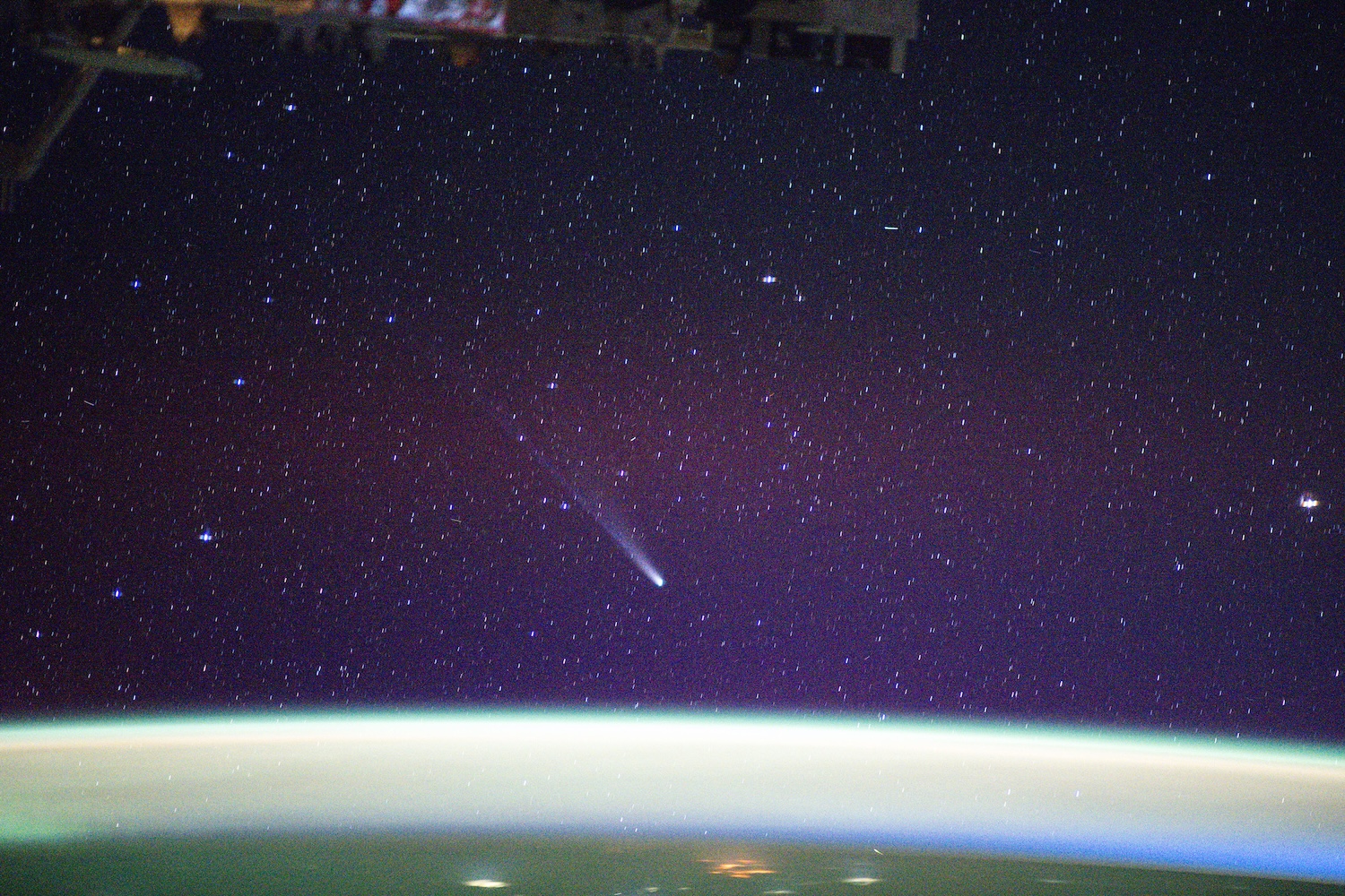 ISS astronauts photograph two comets soaring over Earth's auroras ...