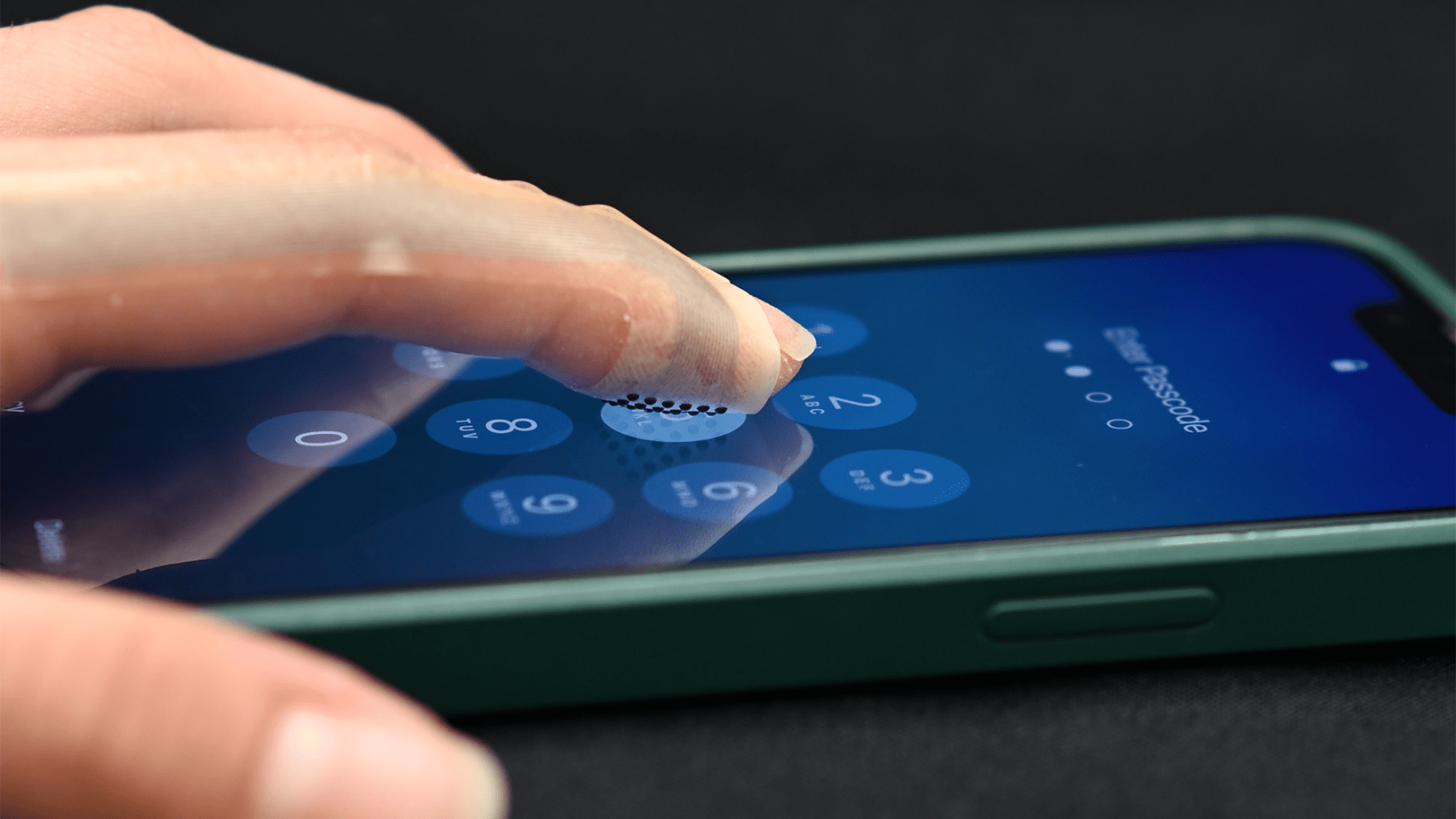 New wearable device lets you touch fabric online, read braille, and ...