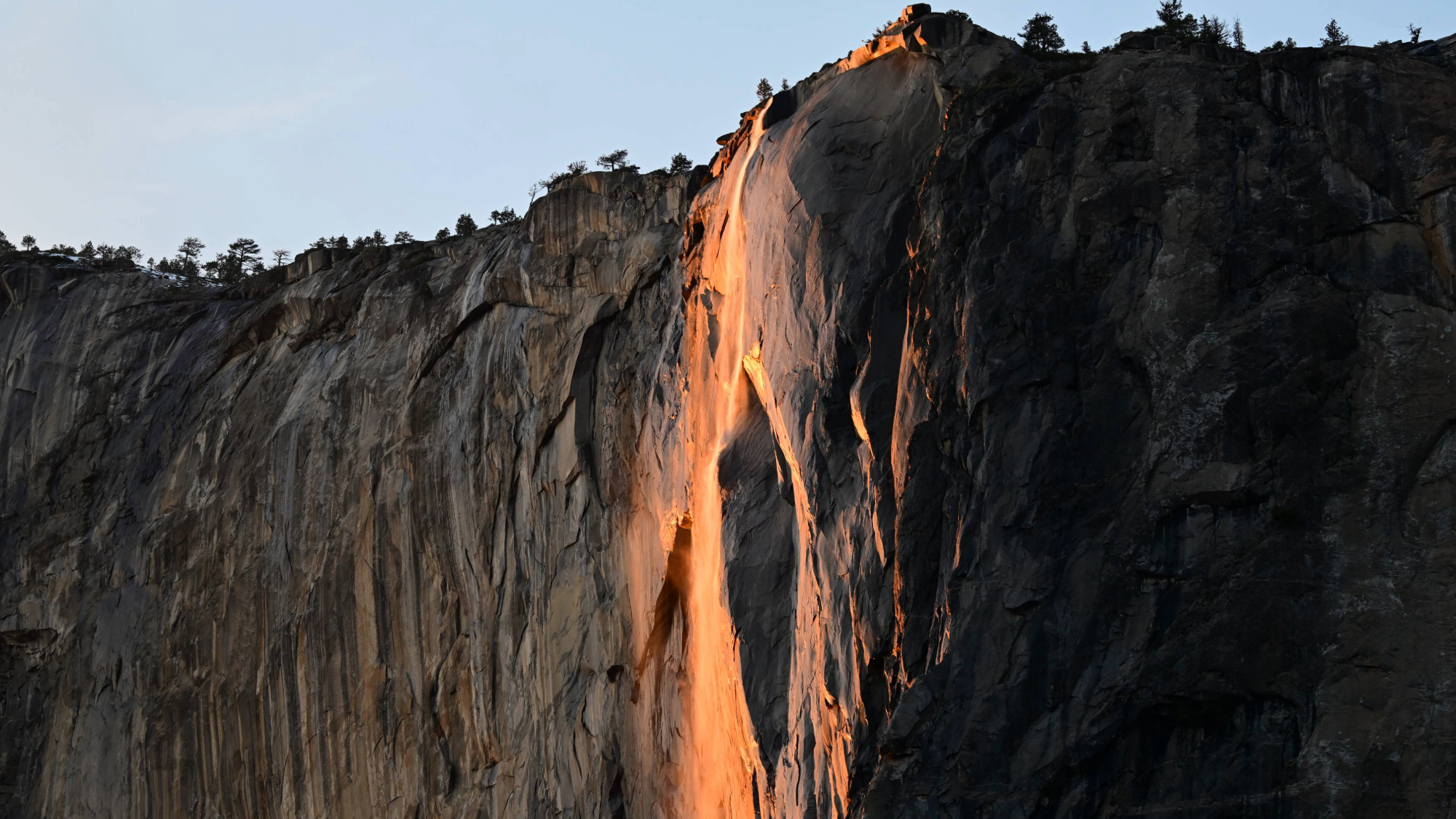 Yosemite's glowing, golden waterfall is flowing again | Popular Science
