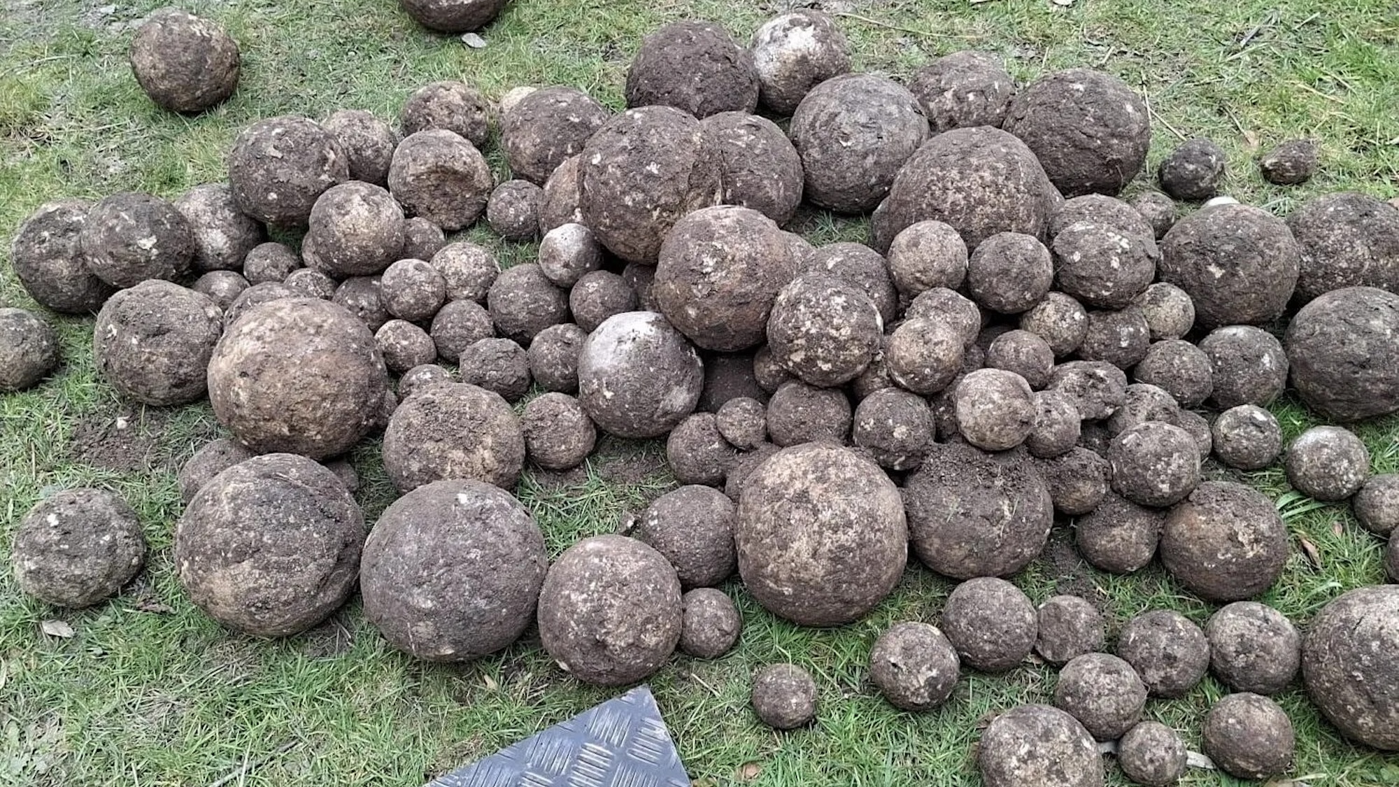 Medieval cannonballs and WWI bomb discovered under construction site ...